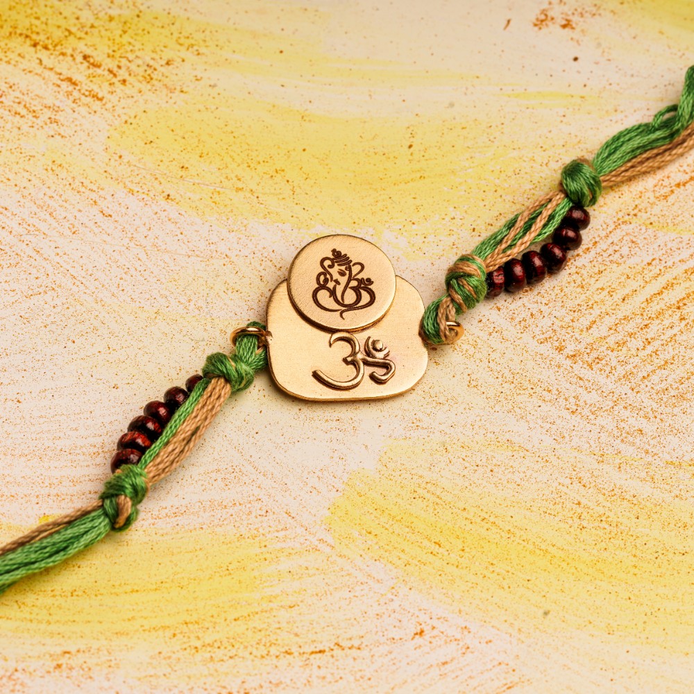 Buy Religious Om and Laser Ganeshji Rakhi with Chandan Beads Online ...